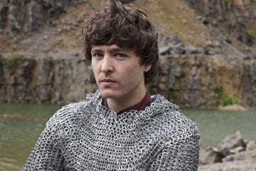 Sleeve, Collar, Jaw, Rock, Bedrock, Sweater, Brown hair, Outcrop, Portrait photography, Portrait, 