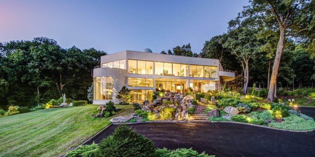 Escape The City Hustle In This Stunning Glass Mansion