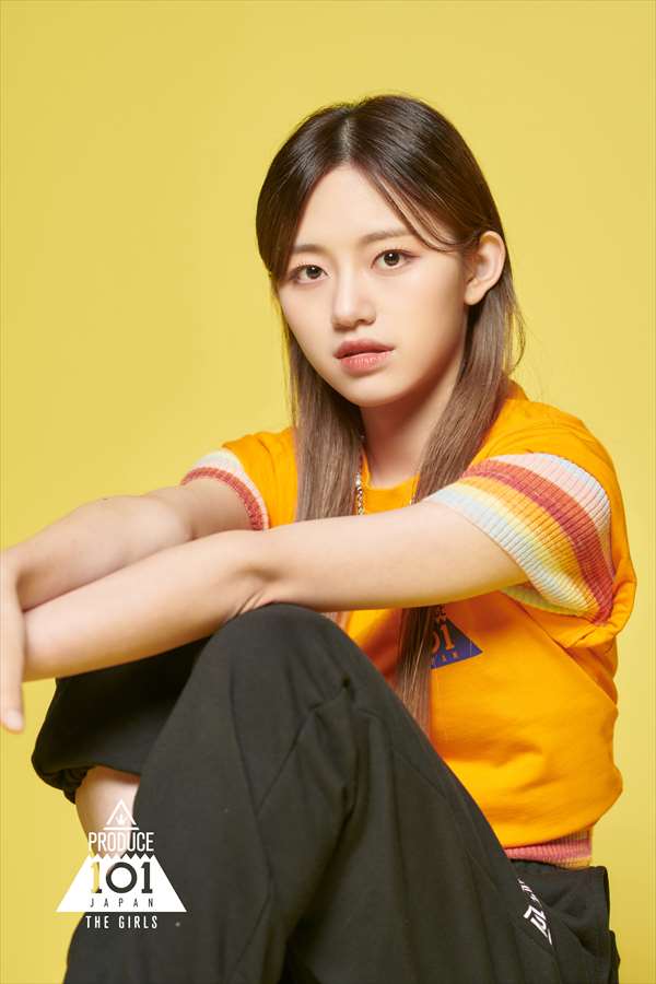 a woman with her arms crossed
