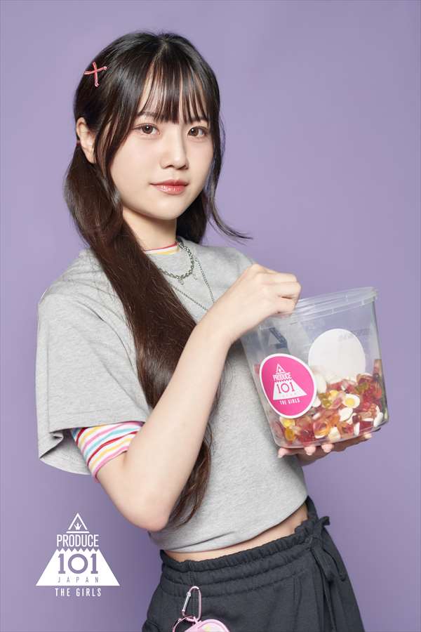 a woman holding a box of candy