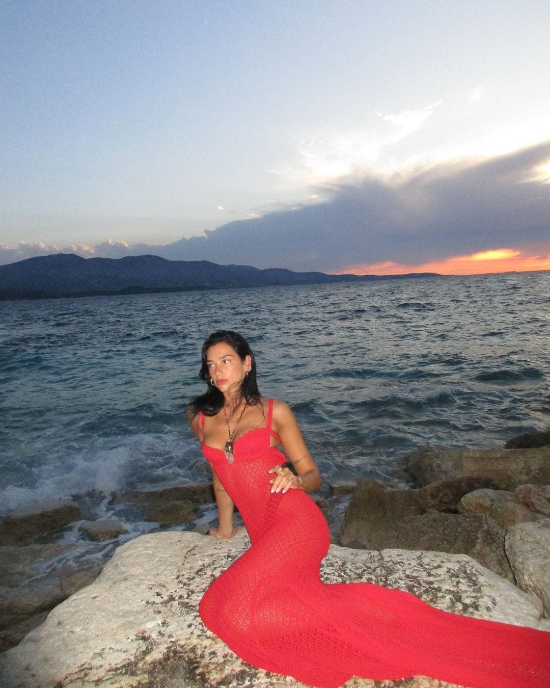 See Dua Lipa Do Mermaidcore In A See Through Red Crochet Gown