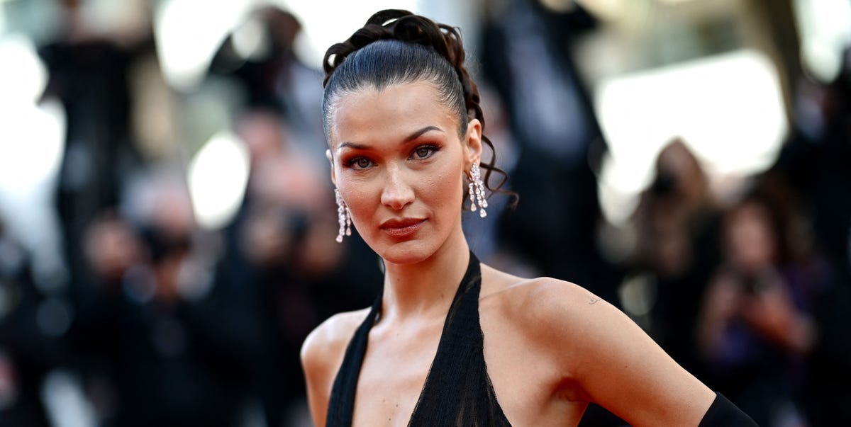 Bella Hadid Wears Cinched Bustier Versace Gown At Cannes Film Festival