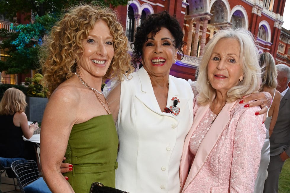 Dame Shirley Bassey Wears Chic White Suit