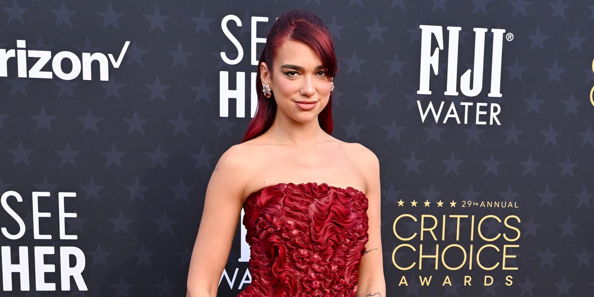 Dua Lipa Just Wore a Prada Gown That Perfectly Matches Her New Hair Dua Lipa Just Wore a Prada Gown That Perfectly Matches Her New Hair