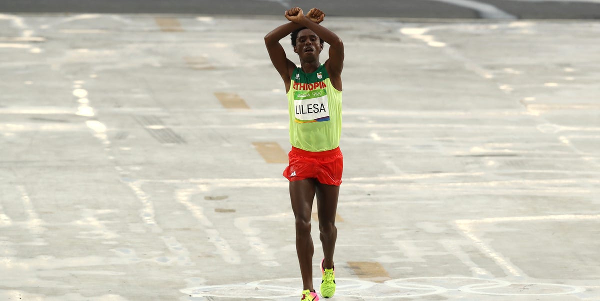 Feyisa Lilesa Returns to Ethiopia - Ethiopian Marathoner Back From Self ... Feyisa Lilesa Returns to Ethiopia - Ethiopian Marathoner Back From Self ...