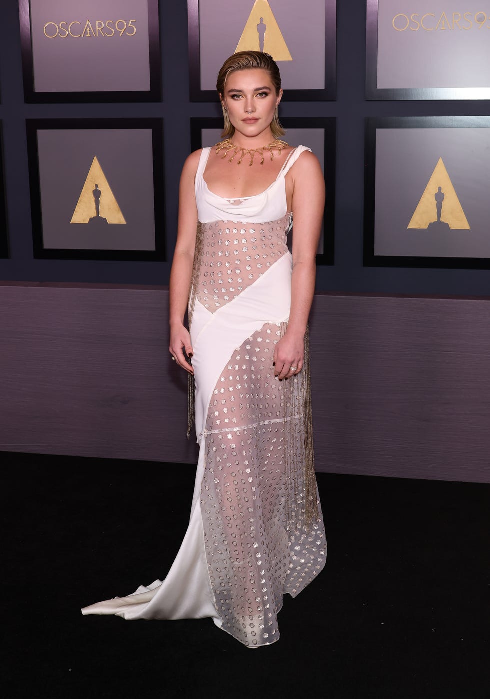 Florence Pugh Stuns In See Through Metallic White Dress