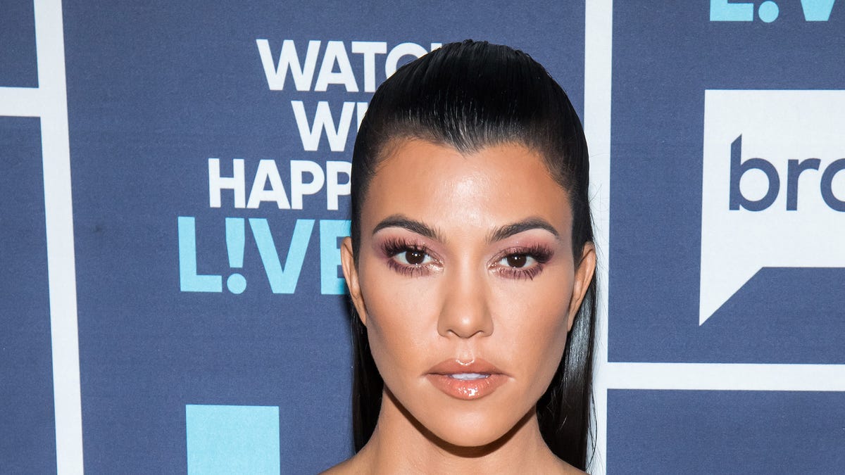 Kourtney Kardashian Posts The Ultimate Thirst Trap In A Strappy Thong
