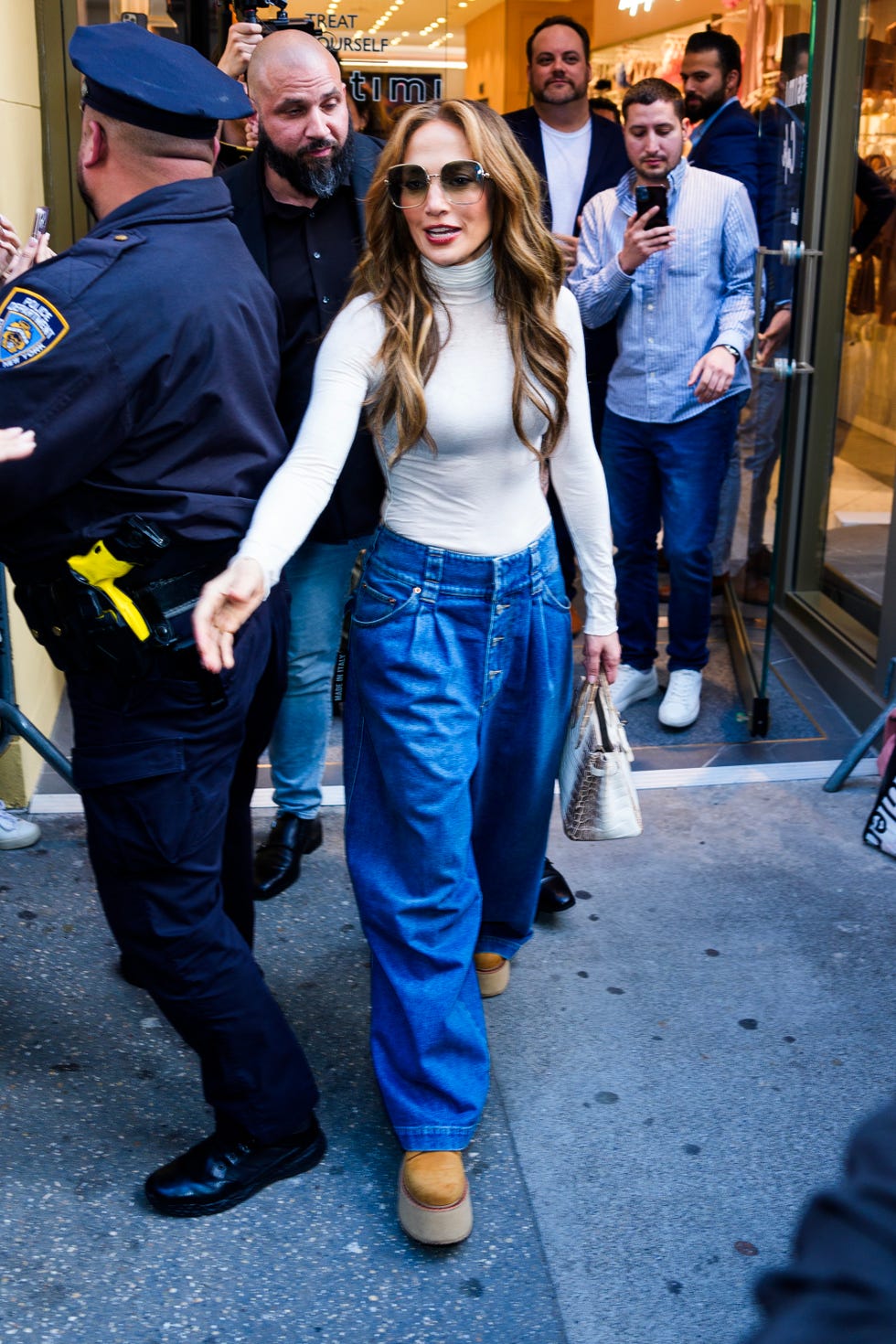 Jennifer Lopez Keeps Wearing The Same Cool Wide Leg Jeans