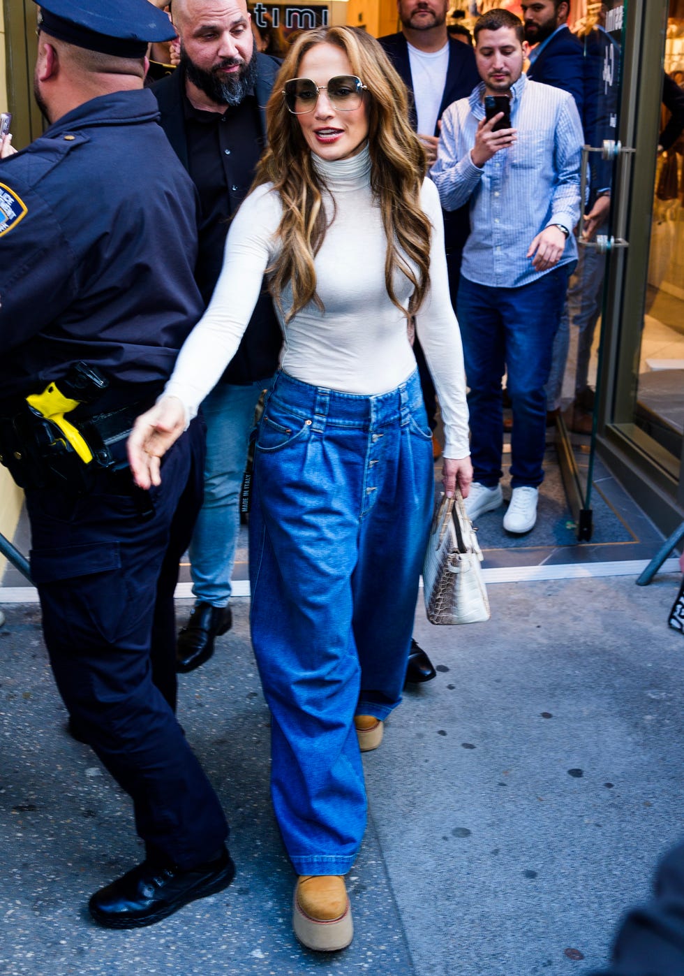 Jennifer Lopez Keeps Wearing The Same Cool Wide Leg Jeans