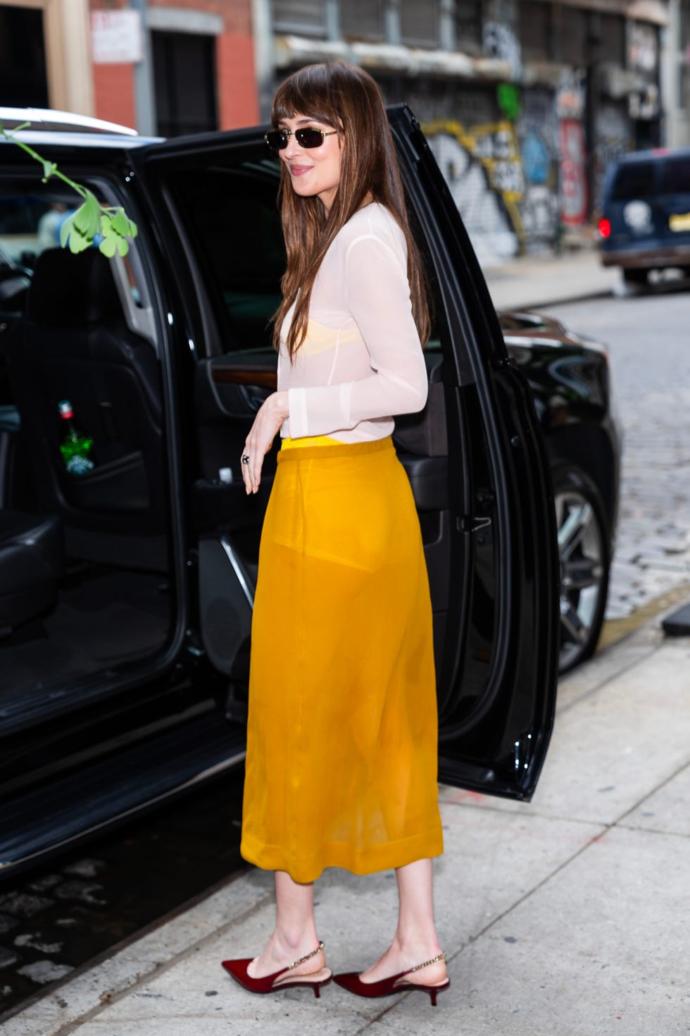 Dakota Johnson Isnt Letting Go Of The Sheer Lingerie Trend Any Time Soon