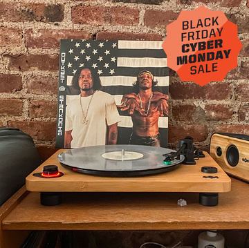 turntable setup with an album cover and a sale banner turntable setup with an album cover and a sale banner