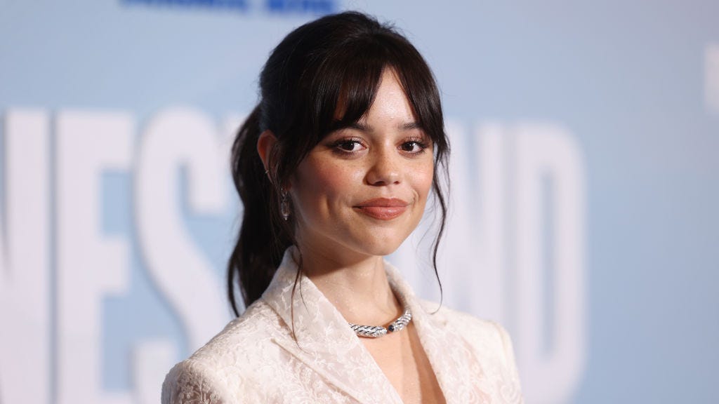 Jenna Ortega’s Sheer Corseted Lace Blazer Doubles as a Minidress Jenna Ortega’s Sheer Corseted Lace Blazer Doubles as a Minidress