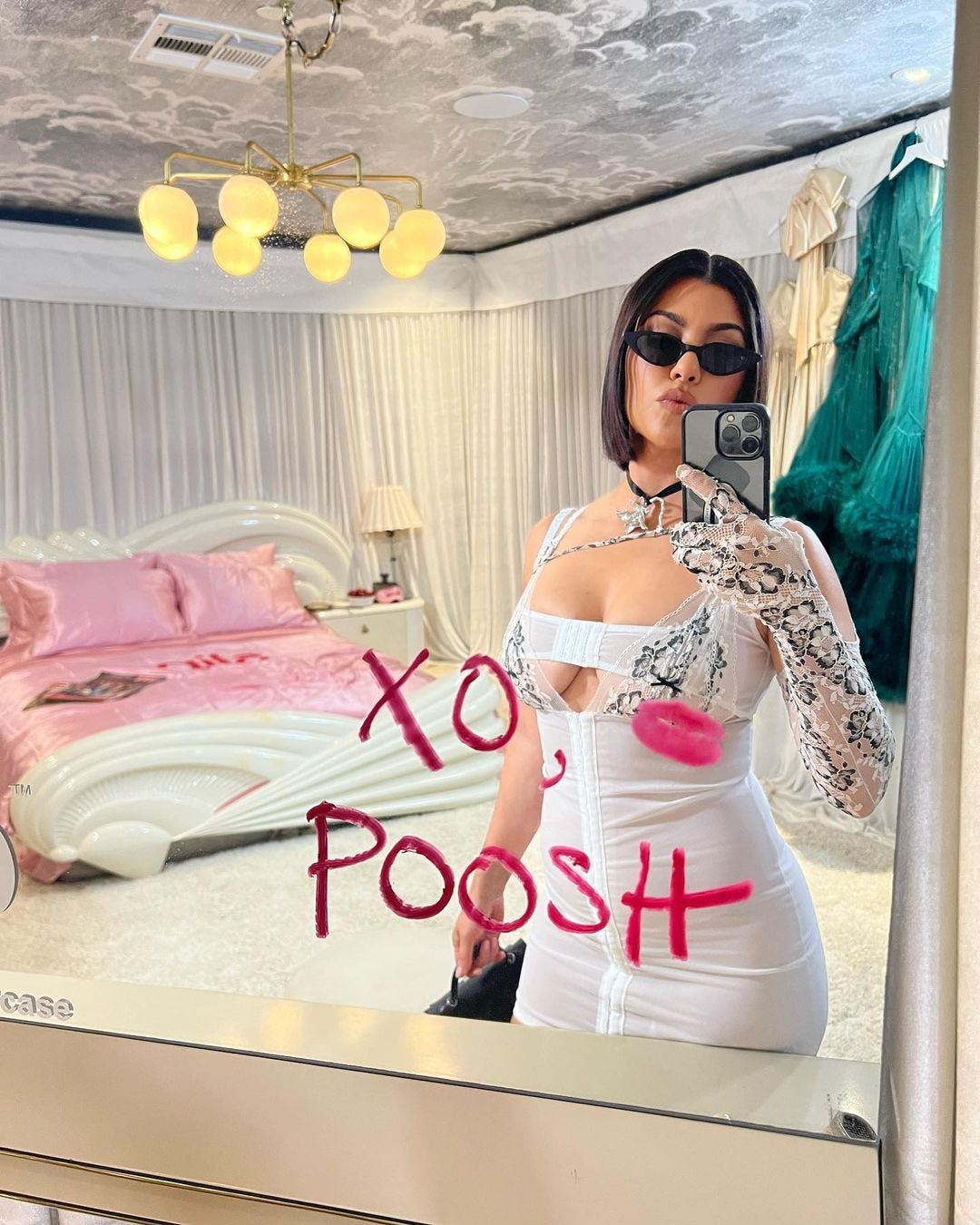 Kourtney Kardashian Wears Sequin Bikini With Holographic Pants