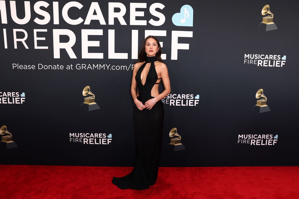 Olivia Rodrigo Wears a Plunging Halter Dress Alongside Louis Partridge ... Olivia Rodrigo Wears a Plunging Halter Dress Alongside Louis Partridge ...