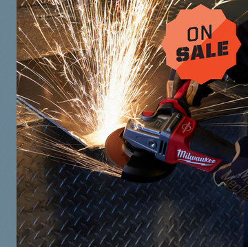 electric sanding tool and angle grinder side by side with a sales banner electric sanding tool and angle grinder side by side with a sales banner