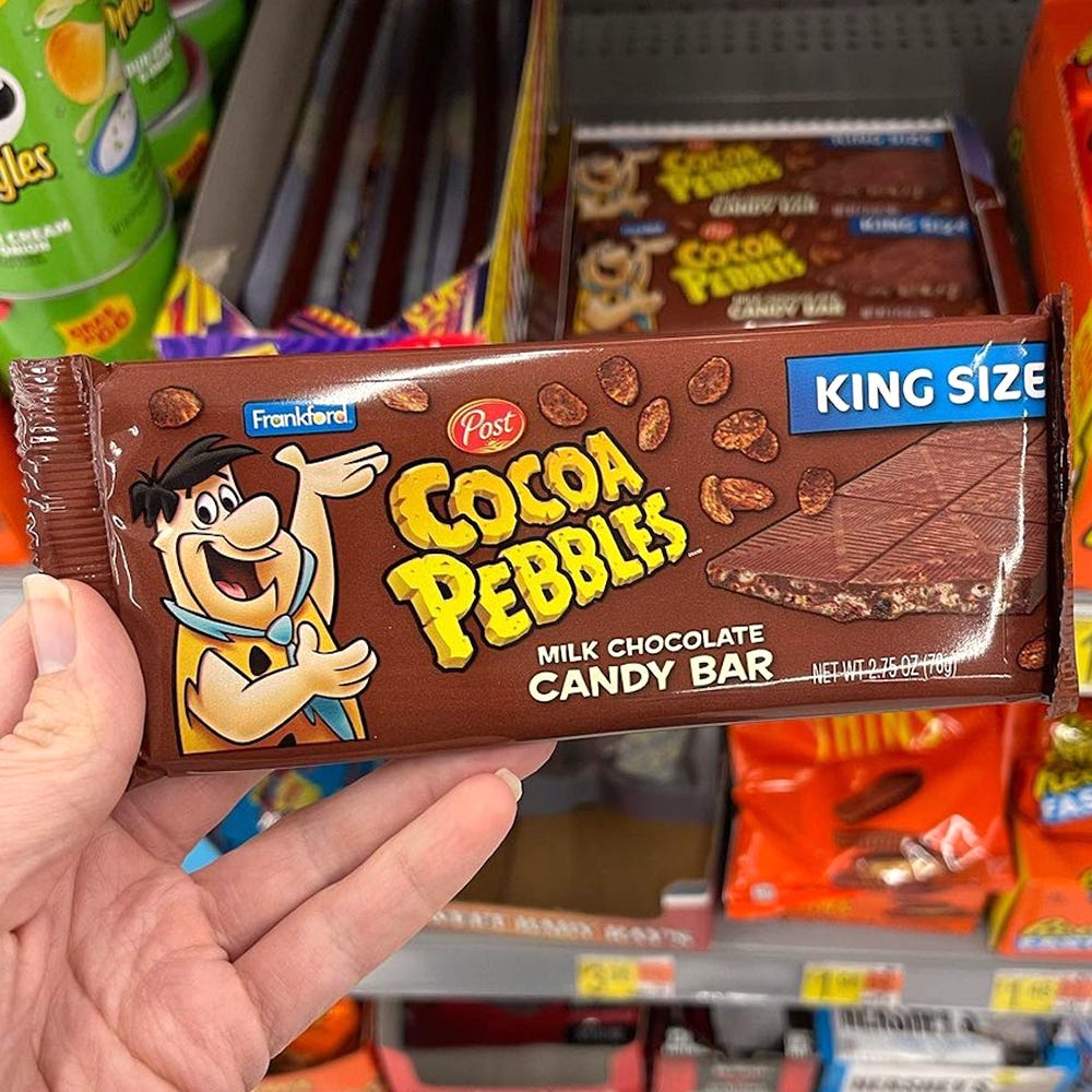 The New Cocoa Pebbles Candy Bar Is Made With Milk Chocolate And Cereal