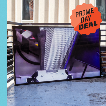 tv on a tv stand, an outdoor tv propped against railing tv on a tv stand, an outdoor tv propped against railing
