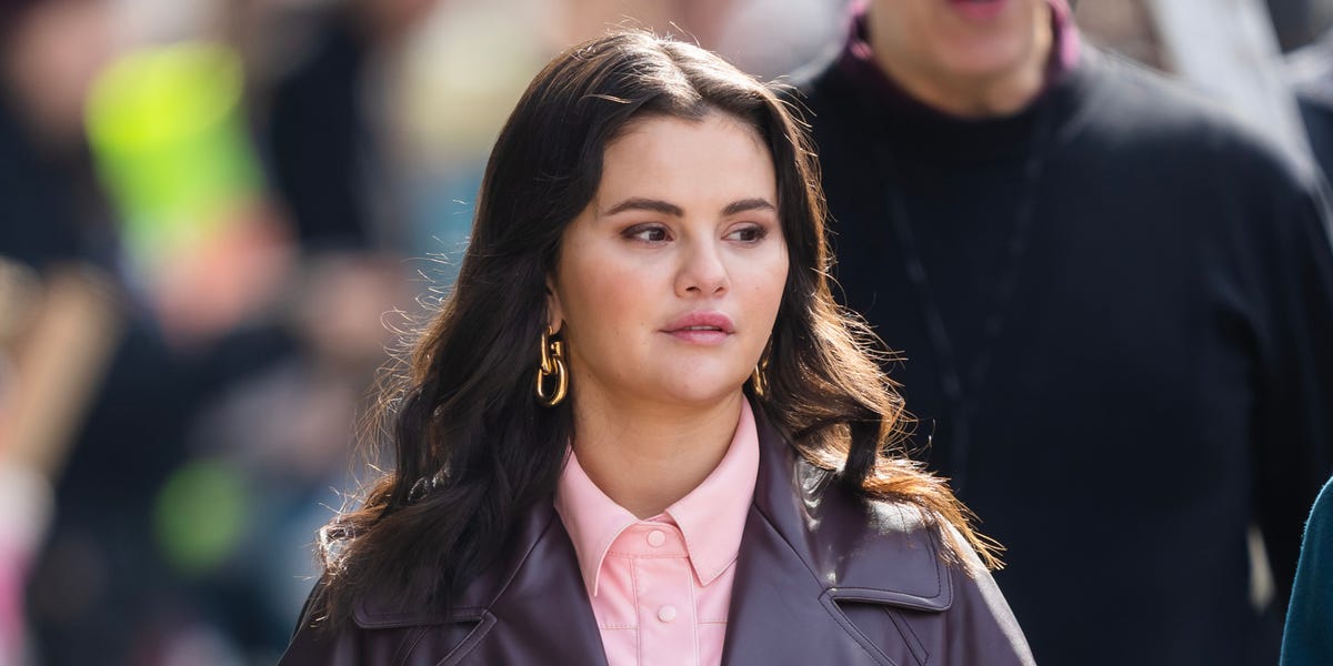 Selena Gomez Wears Strapless Orange Corset And Chic Leather Jacket